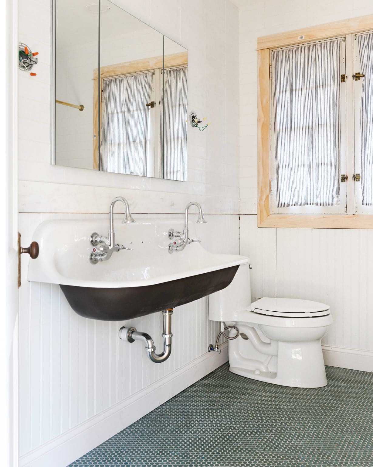 Our DIY Beadboard Wall Treatment with Hooks + Countertop - Yellow Brick ...