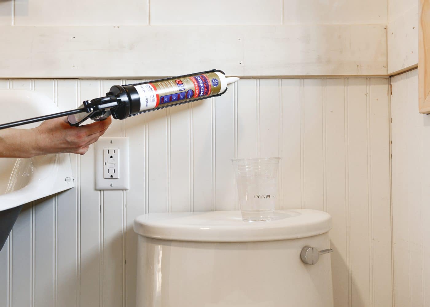 Our DIY Beadboard Wall Treatment with Hooks + Countertop - Yellow Brick ...